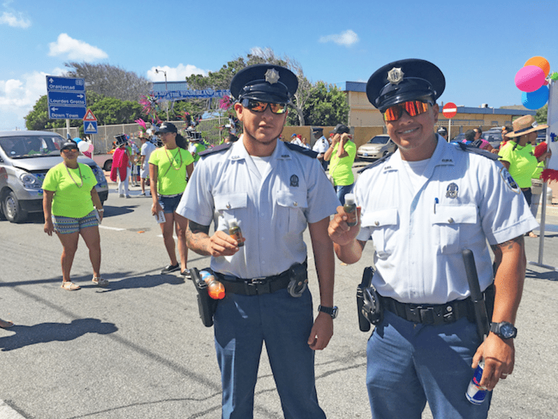 Aruba Aloe Sponsors Aruban Police with Sunscreen for Carnival